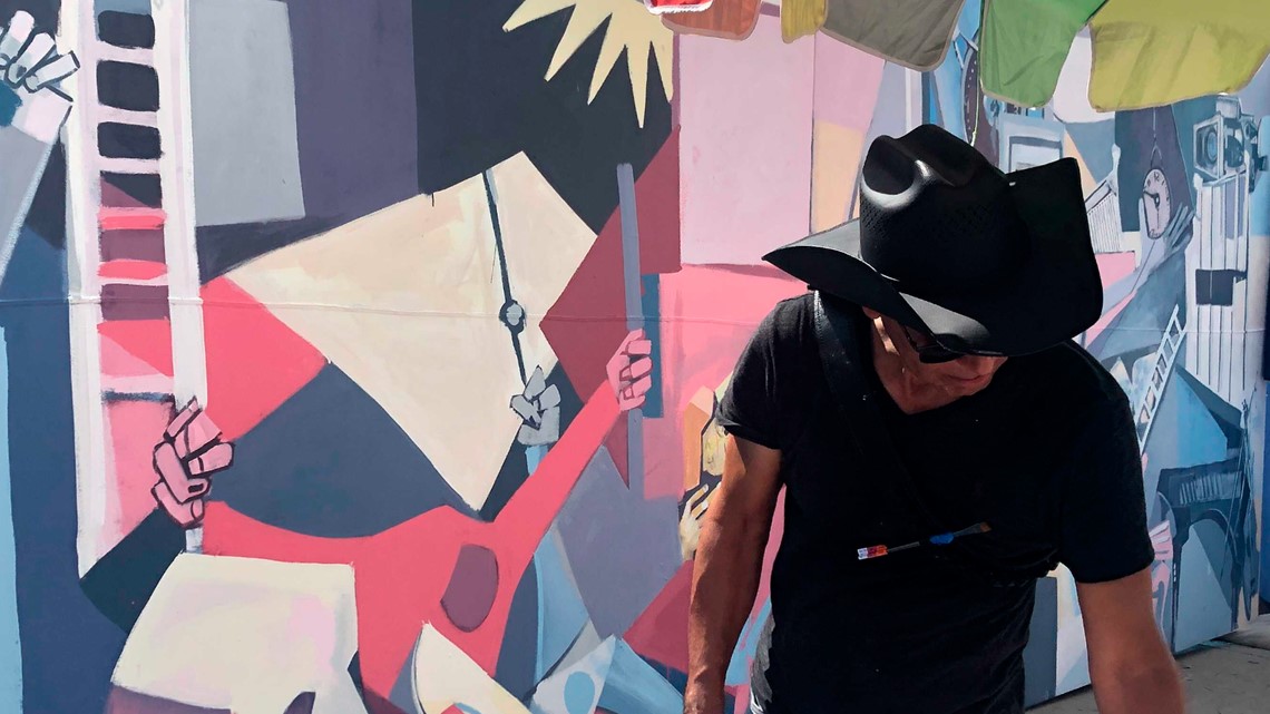 Dallas artists paints mural for Surfside community, victims | 13newsnow.com