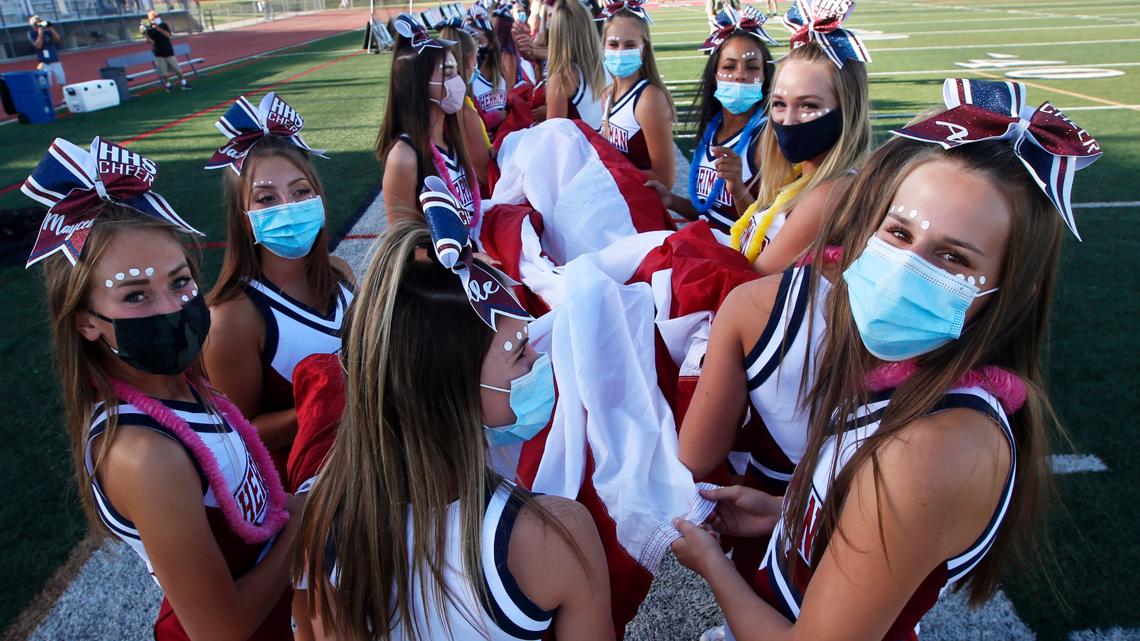 Parents of Virginia HS sideline cheerleaders call for return ...