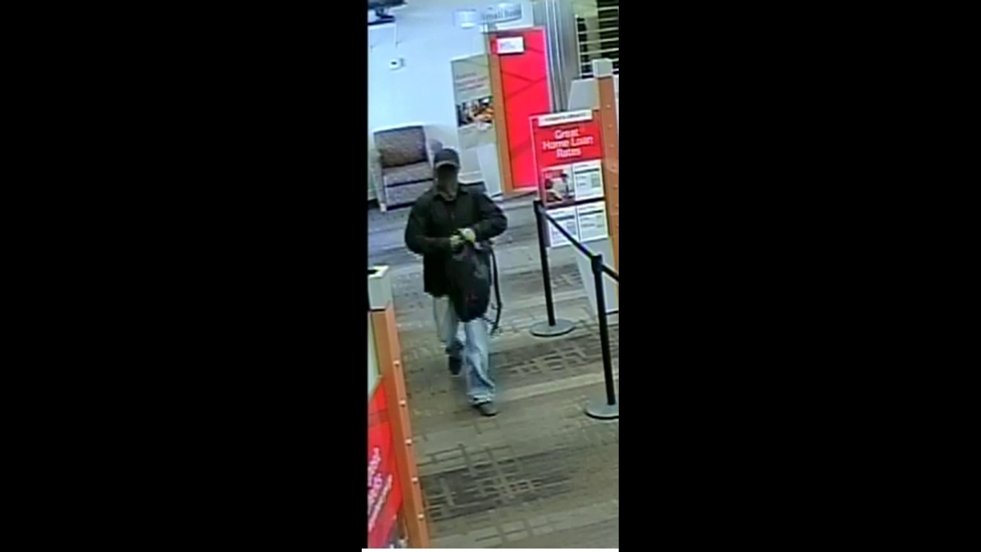 Armed man wanted for Bank of America robbery | 13newsnow.com