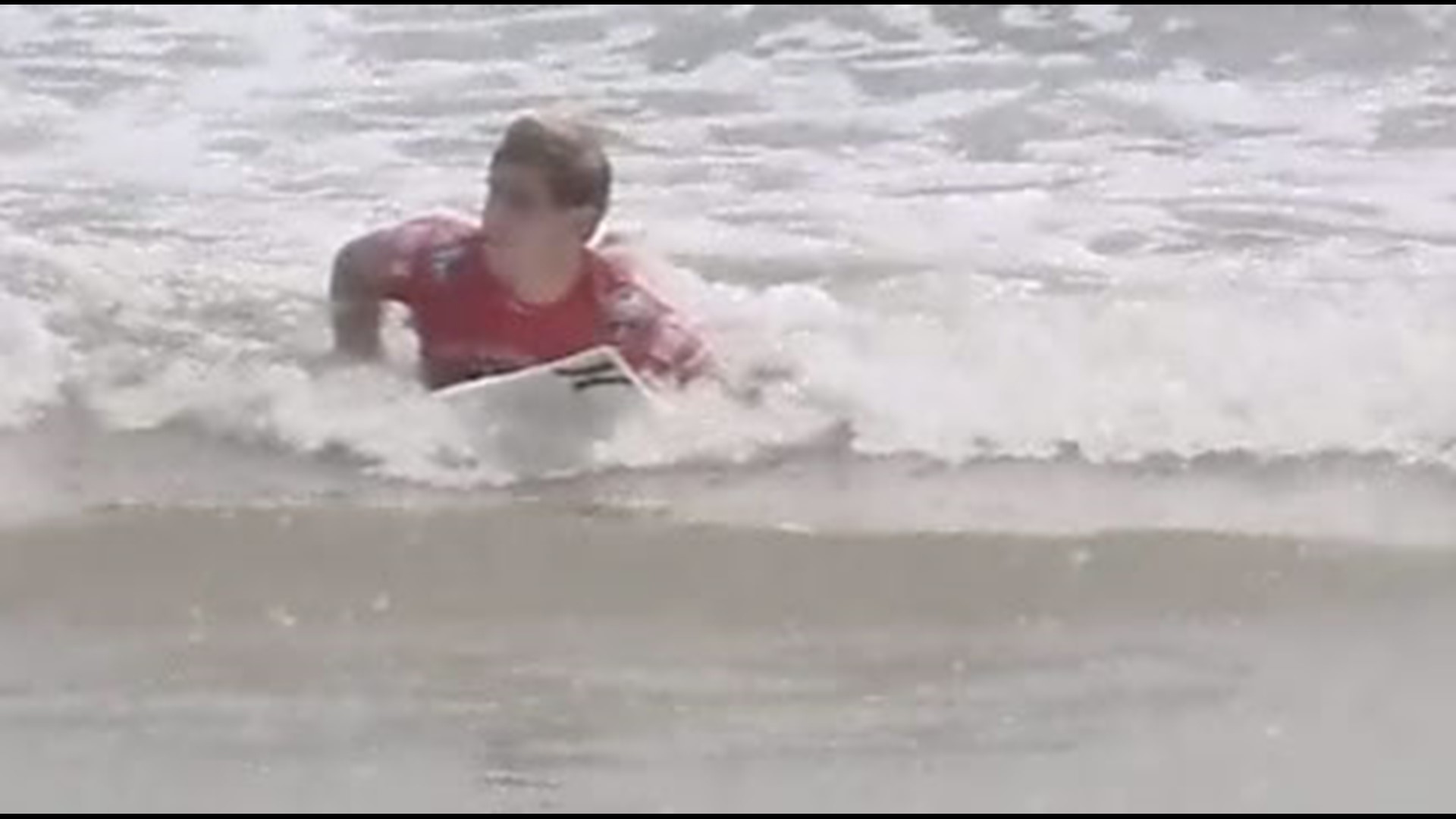 Surf's up, residents out at Sandbridge | 13newsnow.com