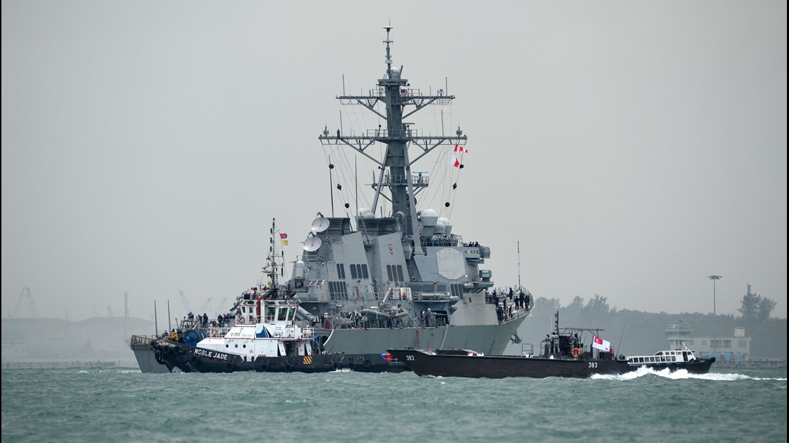 USS John S. McCain returns to the water following deadly collision ...