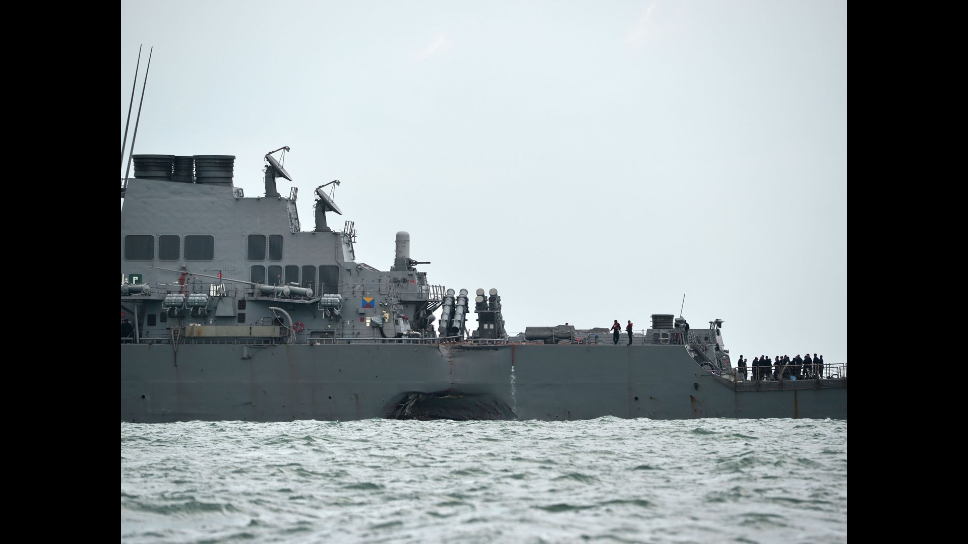 USS John S. McCain returns to the water following deadly collision ...