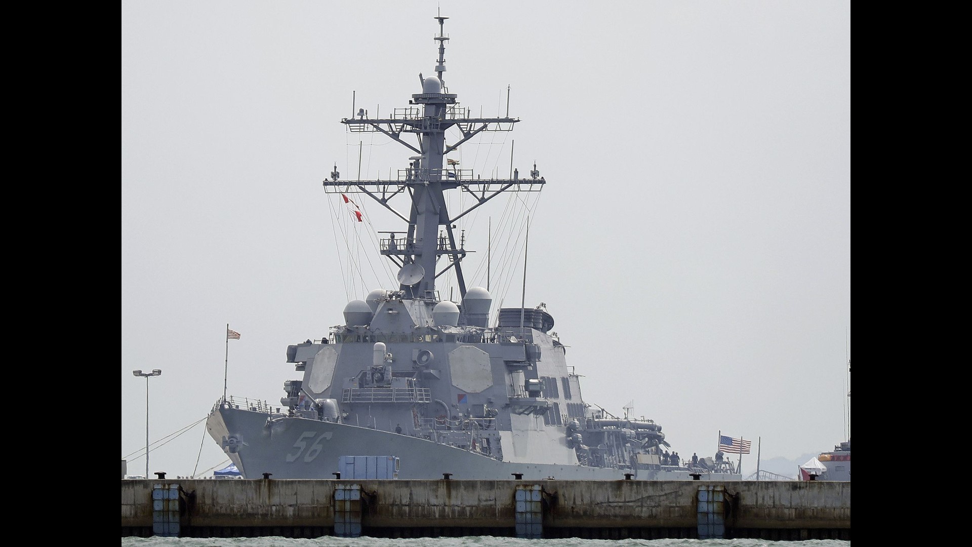 USS John S. McCain returns to the water following deadly collision ...