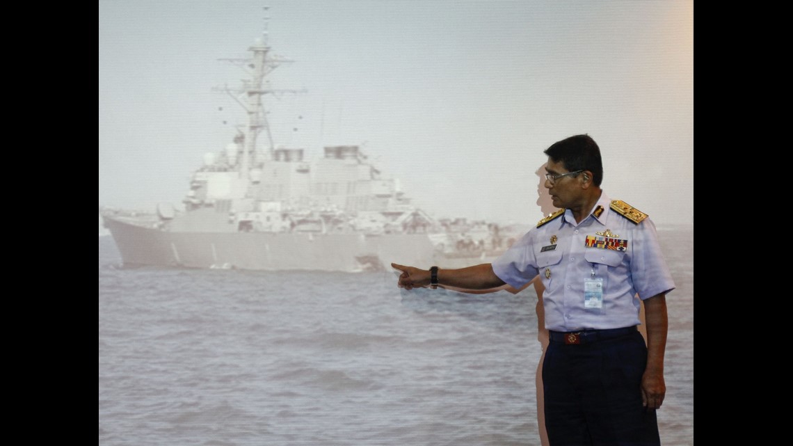 USS John S. McCain returns to the water following deadly collision ...