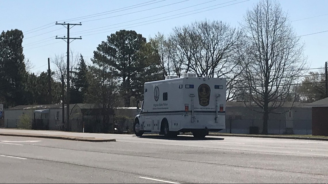 Police surround mobile home in trailer park where person shot at ...