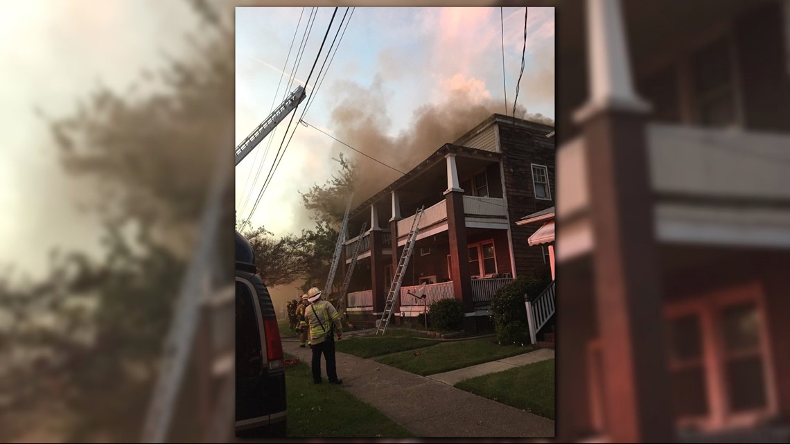 Norfolk firefighters battle two-alarm house fire; 18 people displaced ...