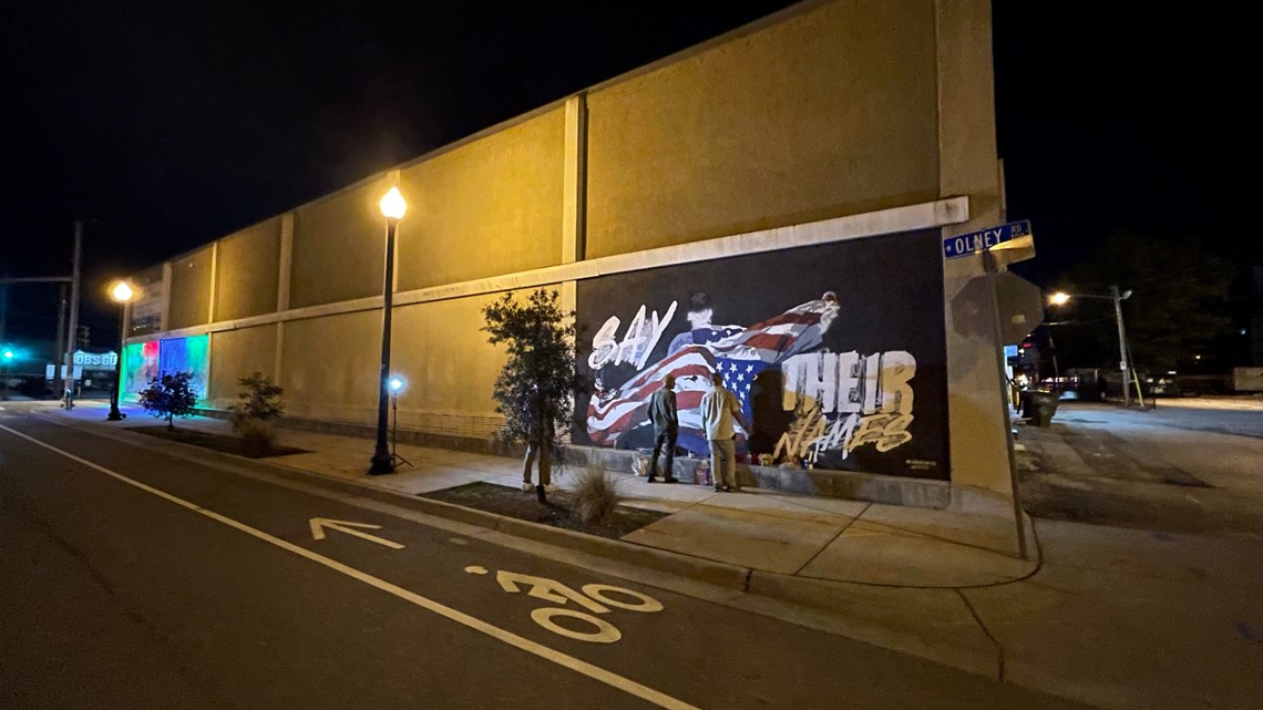 Artists return to fix mural that was vandalized | 13newsnow.com