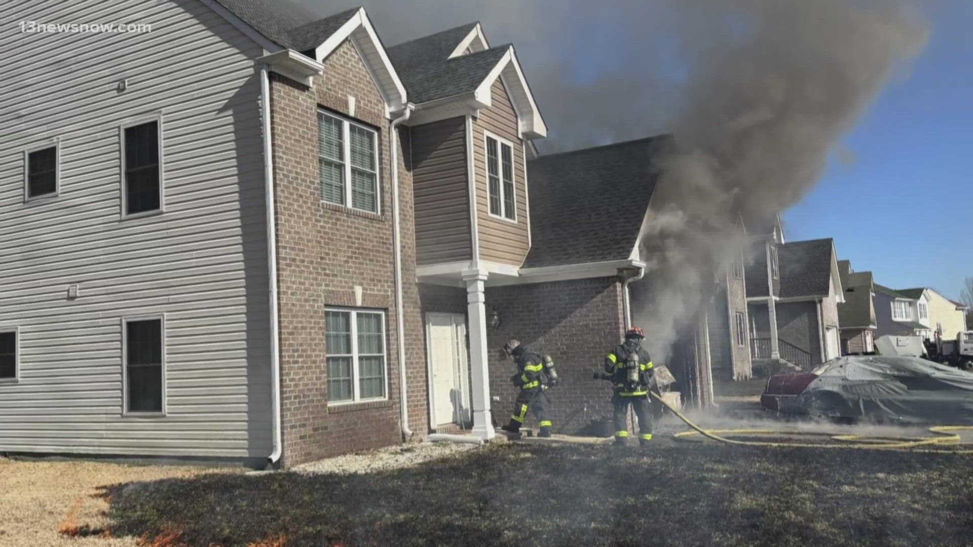 Crowd yells 'cowards!' after federal agents crash into a car and fire ...