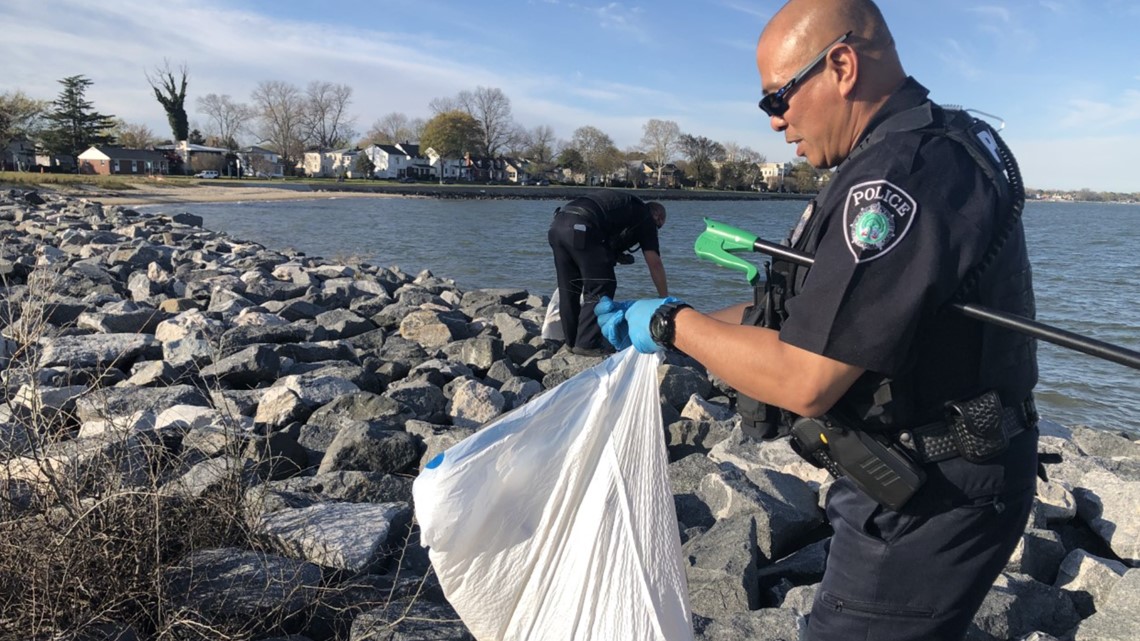 Police, volunteers clean up park where officer was killed | 13newsnow.com