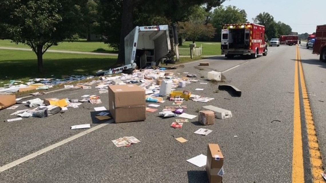 Two people hurt following vehicle crash with Post Office truck ...