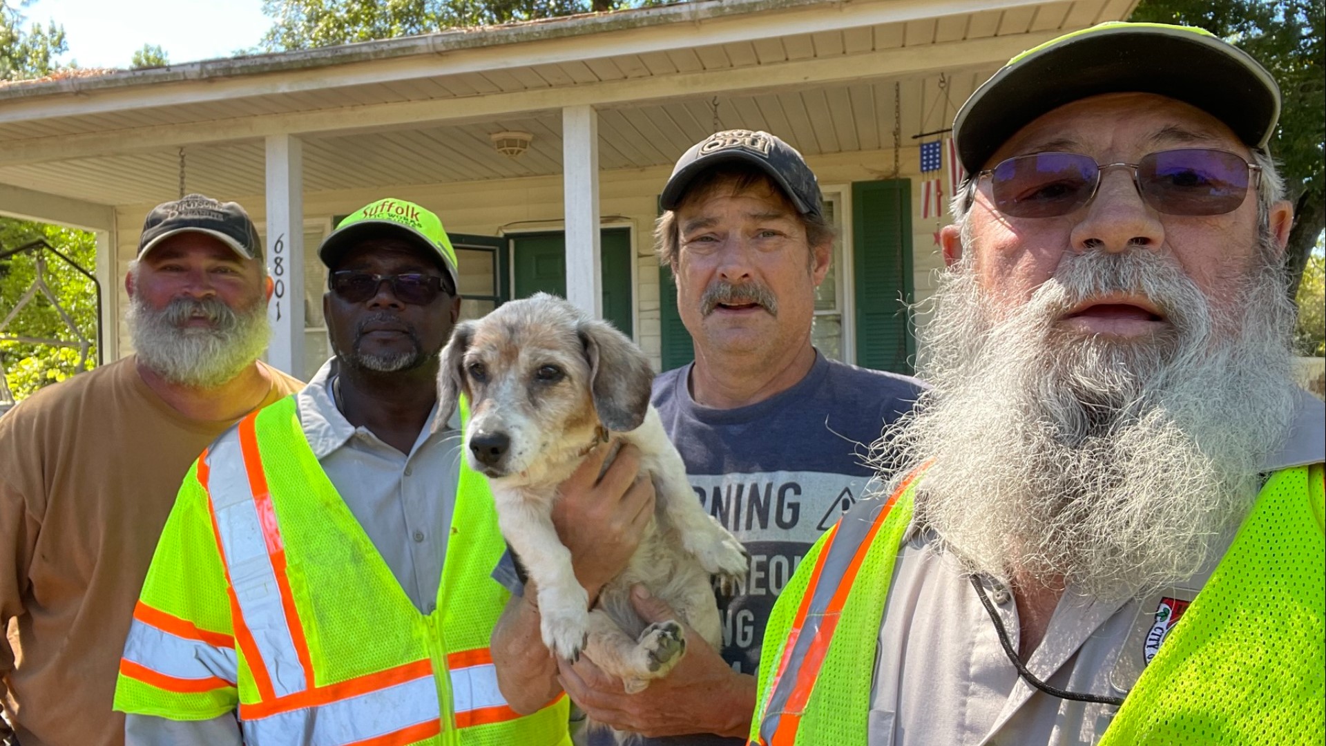 Suffolk Public Works saves dog stuck in driveway pipe | 13newsnow.com