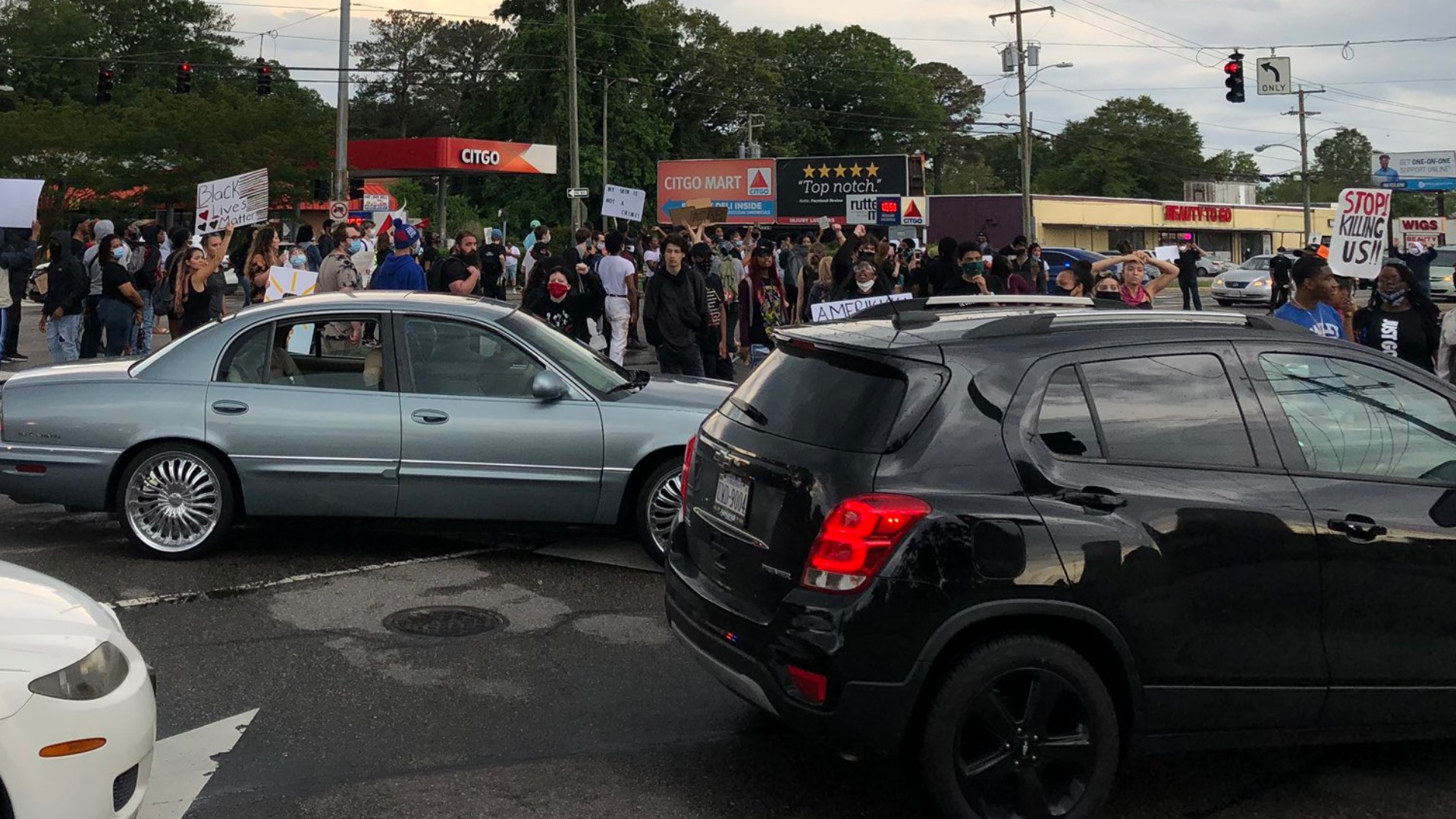 Demonstrators in Norfolk march, rally at locations throughout city ...