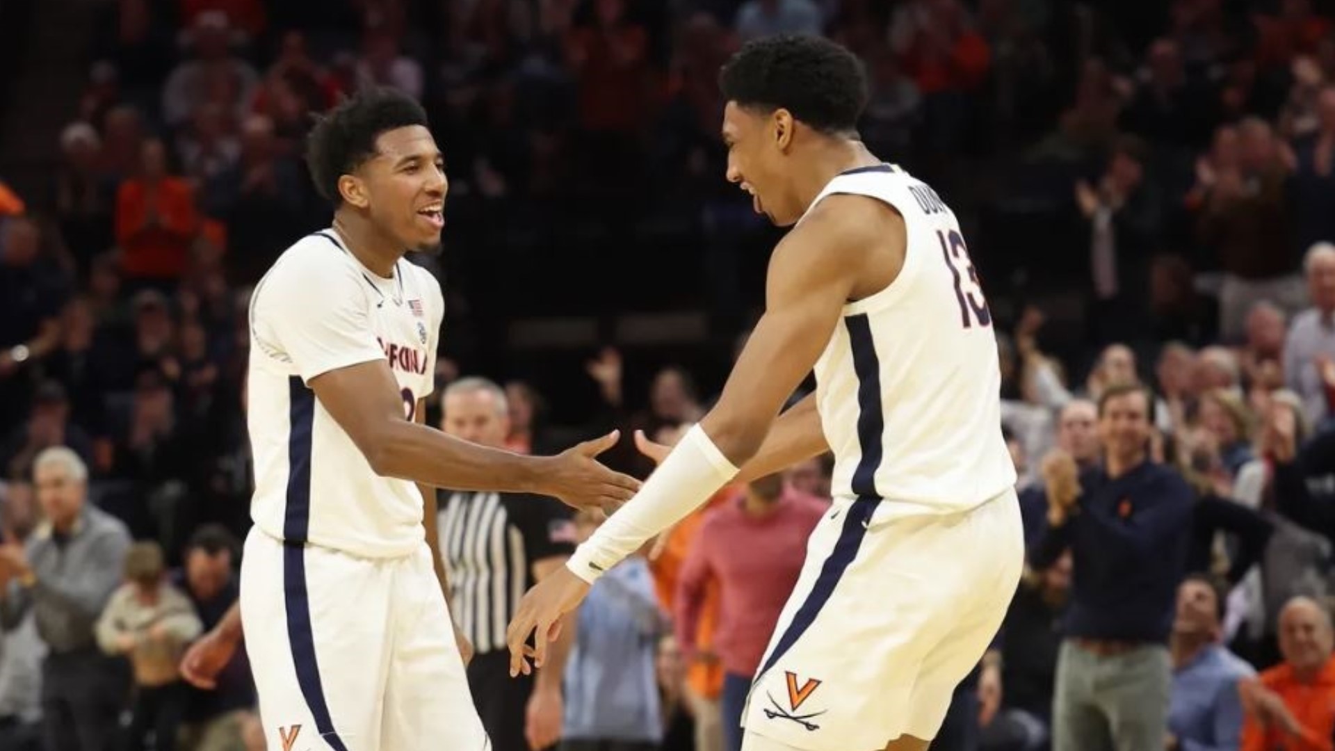McKneely, Dunn power Virginia to 77-53 victory over Louisville ...