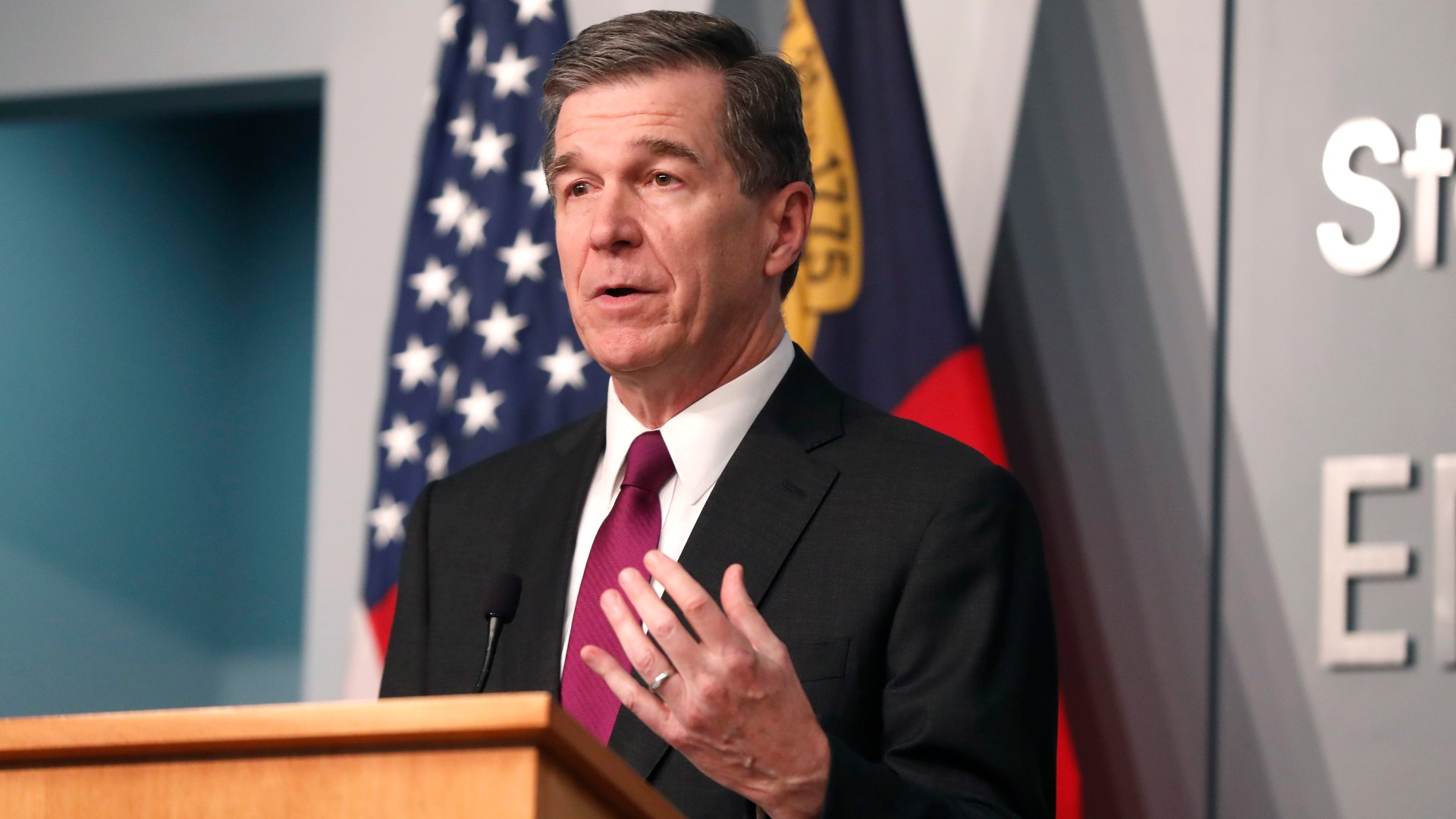 'We're not out of the woods yet' | NC Gov. Cooper moves state to 'Phase ...