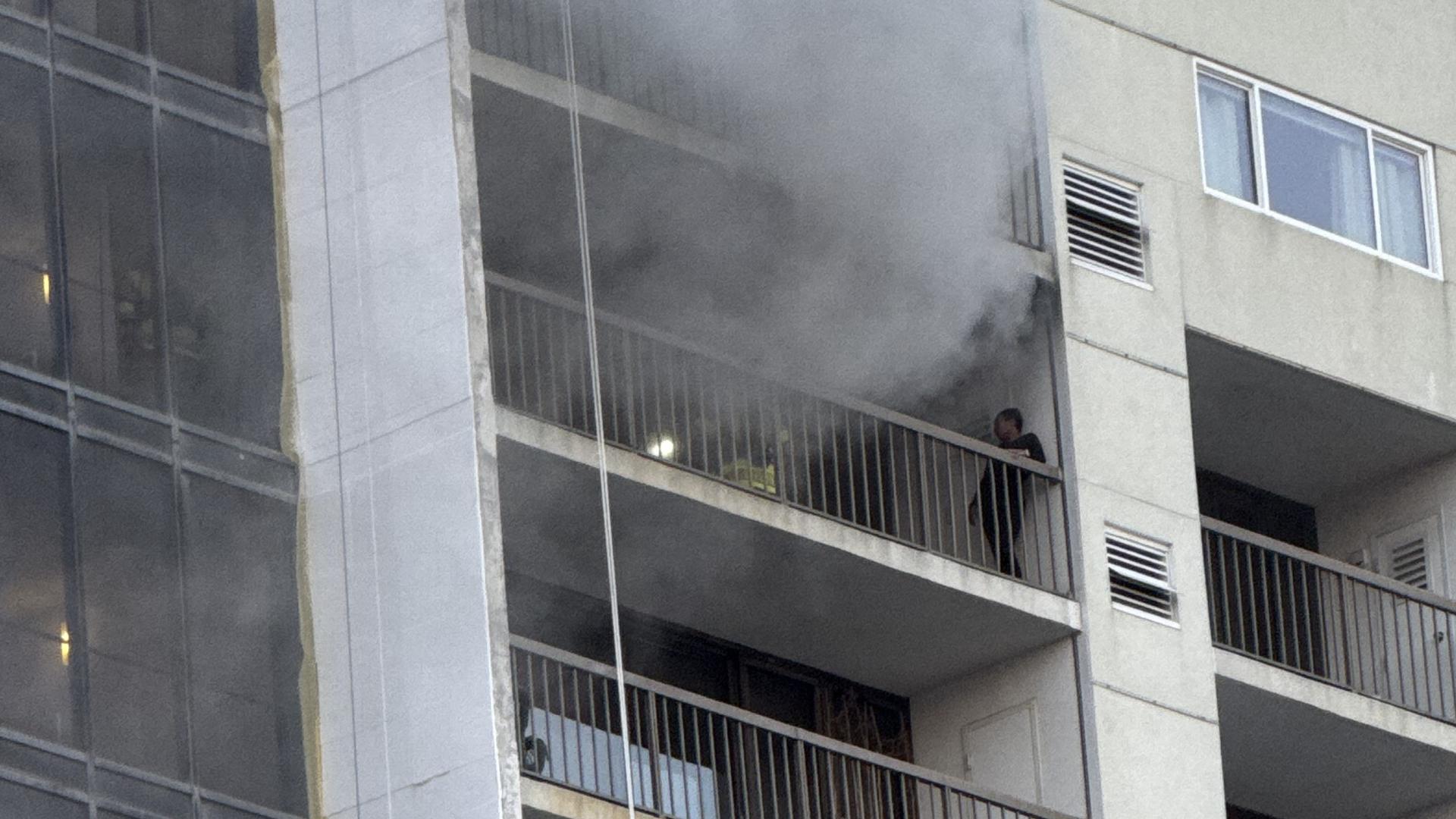 Firefighters battle blaze at Cape Henry Towers; woman saved from 15th ...