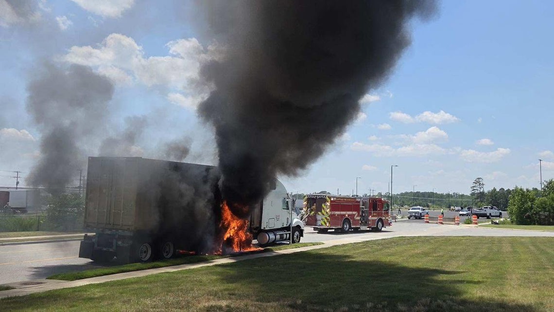 Tractor-trailer hauling solar panels catches fire in Suffolk ...